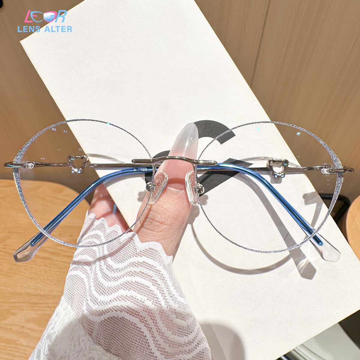 Teddy Silver and Blue Rimless Eyeglasses For Women | LensAlter.com ...